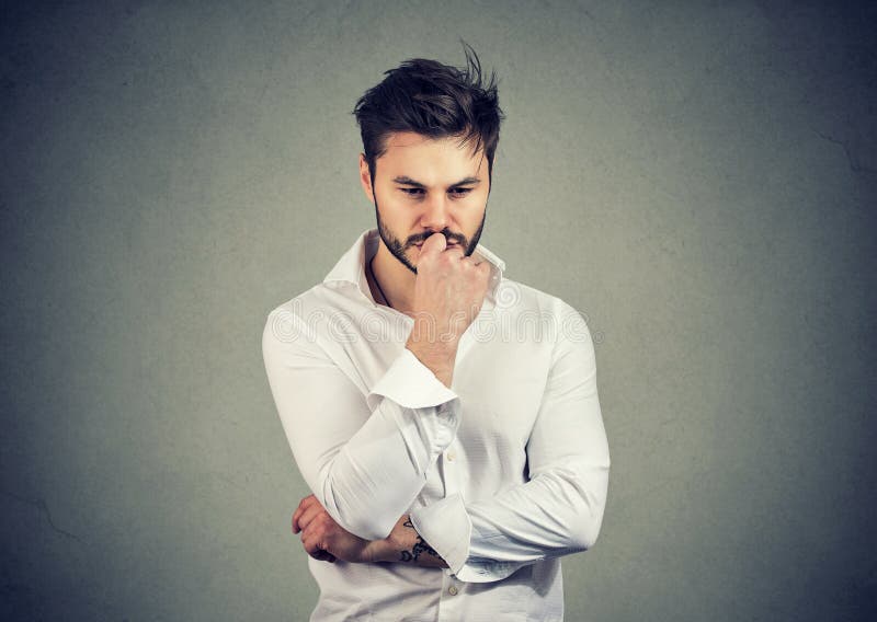 Young Man Considering on Problem Looking Pensive Stock Photo - Image of ...