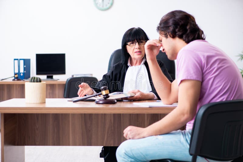 Young Man Consulting with Judge on Litigation Issue Stock Image - Image ...