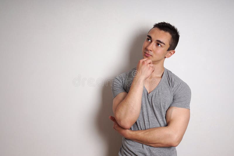 Young Man Contemplating an Idea Stock Image - Image of athletic, look ...