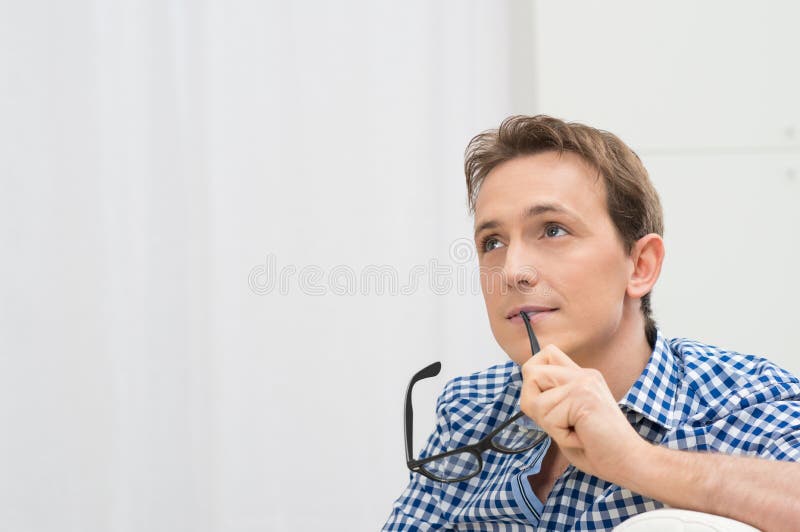 Young Man Contemplating stock image. Image of male, doubtful - 38999839
