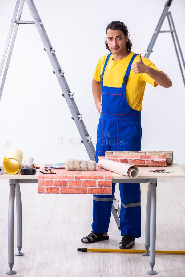 Young Man Contractor Doing Renovation at Home Stock Photo - Image of ...