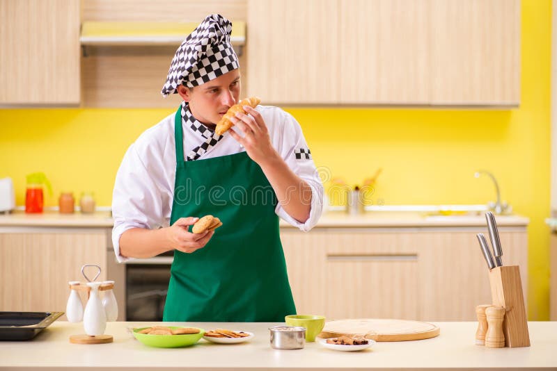 The Young Man Cook Preparing Cake in Kitchen at Home Stock Image ...