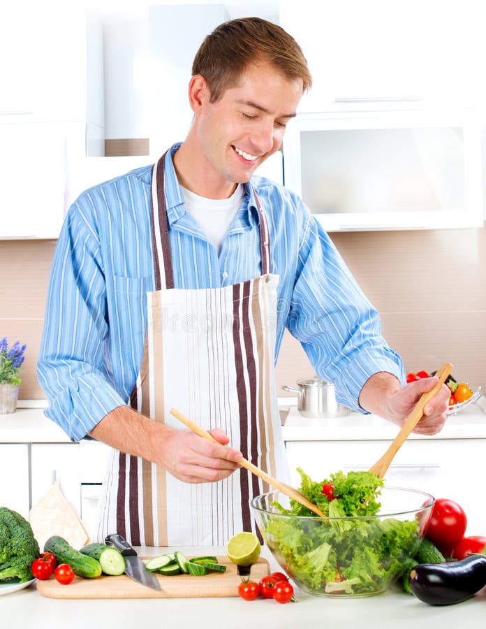 Young Man Cooking stock image. Image of diet, kitchen - 27697797