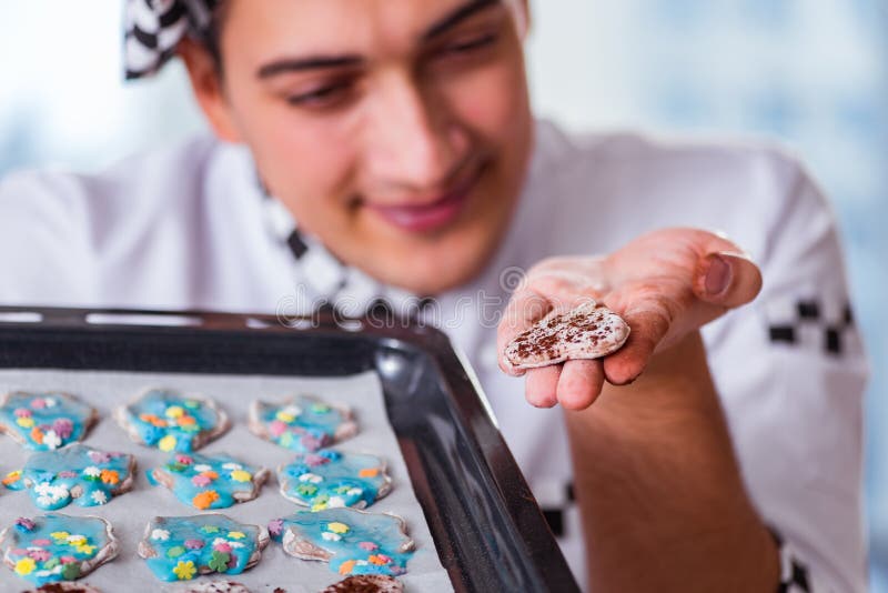 The Young Man Cooking Cookies in Kitchen Stock Image - Image of apron ...