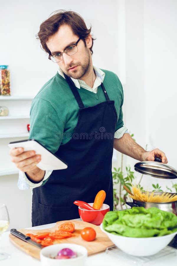 Young Man cooking stock image. Image of digital, young - 41324481