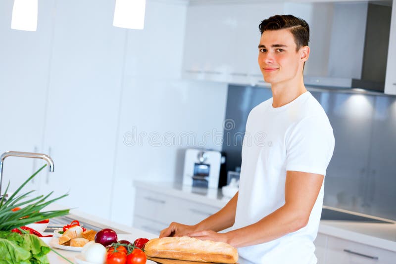 Young man cooking stock image. Image of food, cooking - 112322527