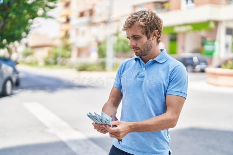 Young Man Counting Dollars at Street Stock Photo - Image of beard ...