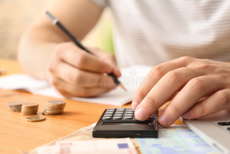 Young Man Counting Money at Table, Closeup Stock Image - Image of ...