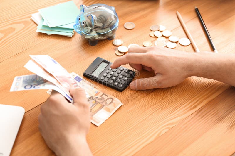 Young Man Counting Money at Table, Closeup Stock Image - Image of ...