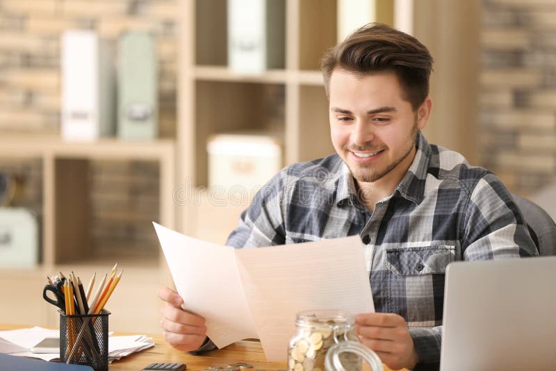 Young Man Counting Money at Table Indoors Stock Photo - Image of budget ...