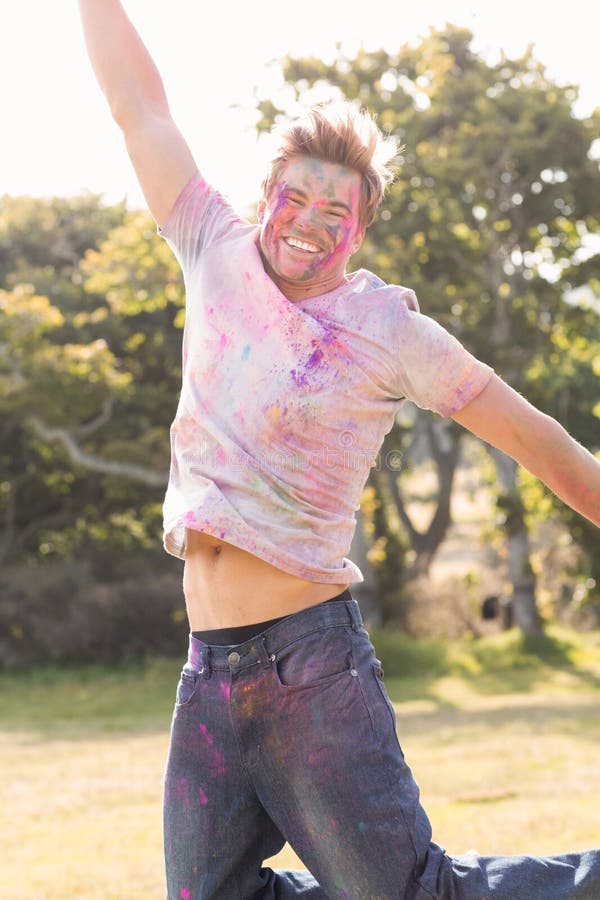 Young Man Covered in Powder Paint Stock Photo - Image of jumping ...