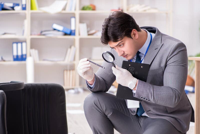 The Young Man during Crime Investigation in Office Stock Photo - Image ...