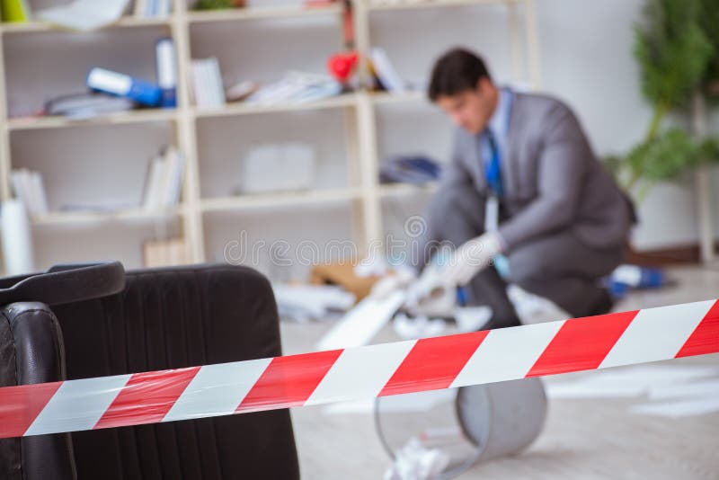 The Young Man during Crime Investigation in Office Stock Photo - Image ...