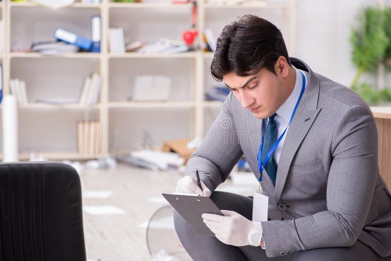 The Young Man during Crime Investigation in Office Stock Photo - Image ...