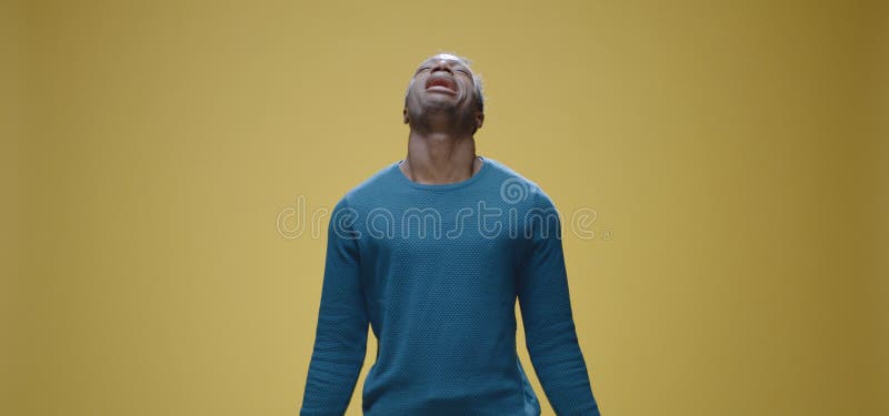 Young man crying to camera stock image. Image of studio - 166223797