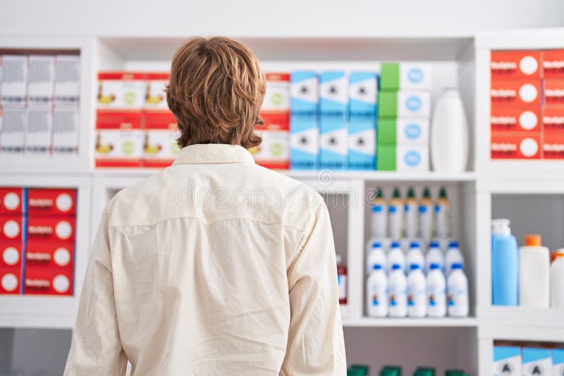Young Man Customer Standing on Back View at Pharmacy Stock Photo ...