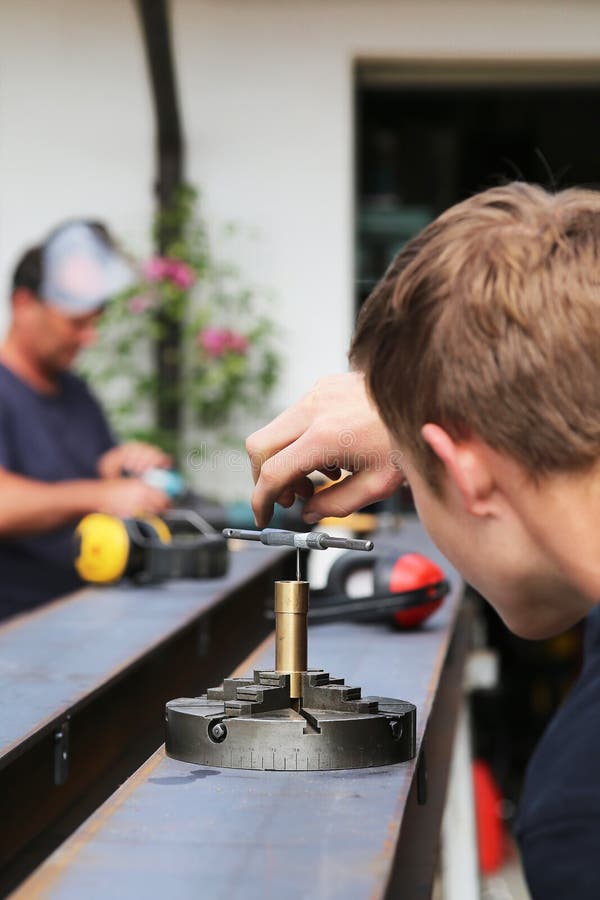 Apprentice Learns To Cut Threads Stock Image - Image of learning ...