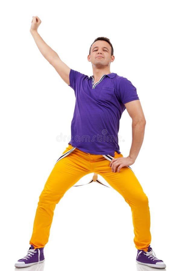 Young man in a dance pose stock photo. Image of muscular - 23685266
