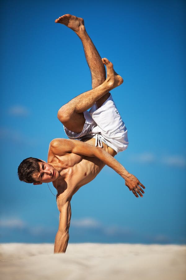 Young man dancing stock photo. Image of breakdancing - 15130642
