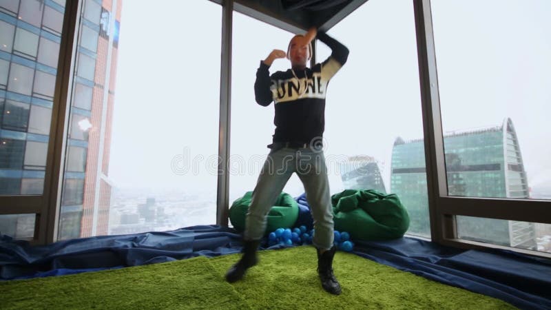 Young Man is Dancing Tectonic on the Carpet in Stock Footage - Video of ...