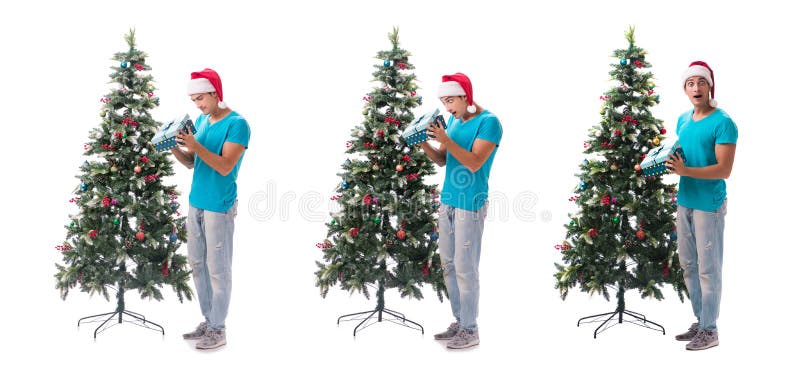 The Young Man Decorating Christmas Tree Isolated on White Stock Photo ...