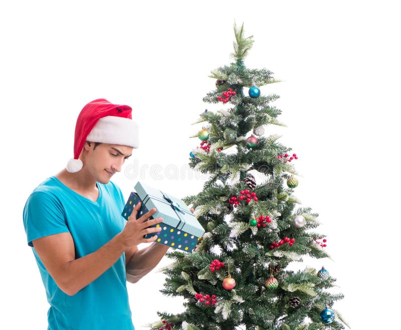 Young Man Decorating Christmas Tree Isolated on White Stock Photo ...
