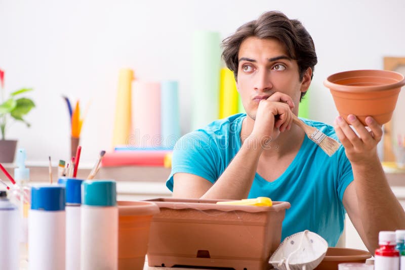 The Young Man Decorating Pottery in Class Stock Photo - Image of ...