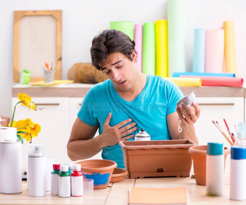 Young Man Decorating Pottery in Class Stock Image - Image of design ...