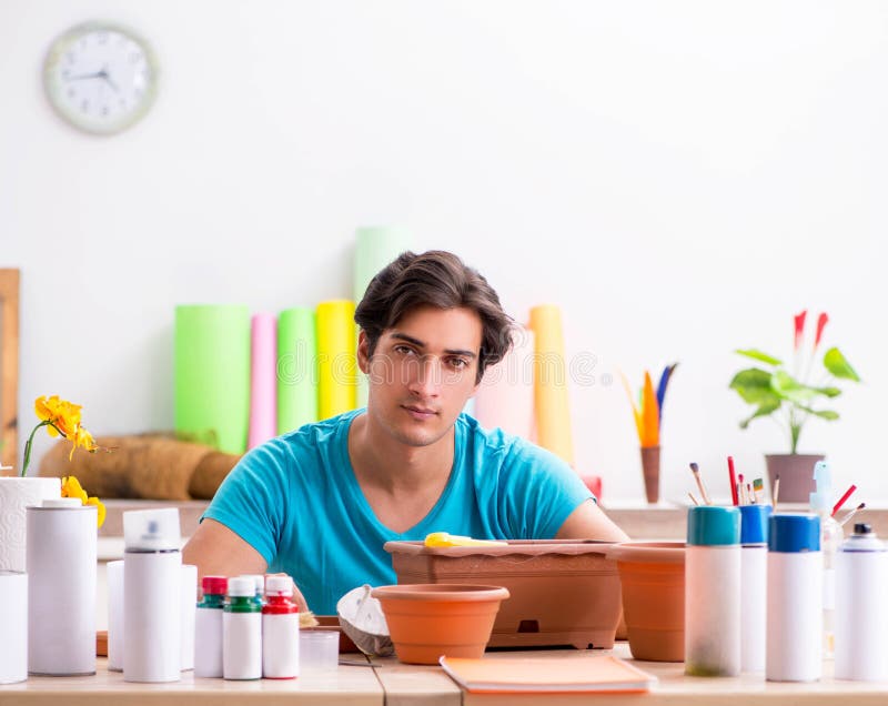 Young Man Decorating Pottery in Class Stock Image - Image of leisure ...