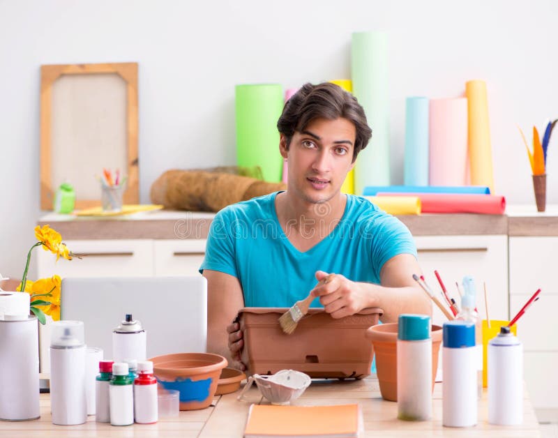 Young Man Decorating Pottery in Class Stock Photo - Image of leisure ...