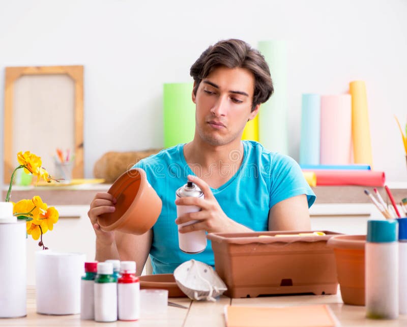 Young Man Decorating Pottery in Class Stock Image - Image of craftsman ...
