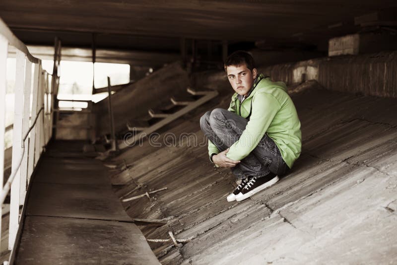 Young man in depression stock photo. Image of male, away - 27778852