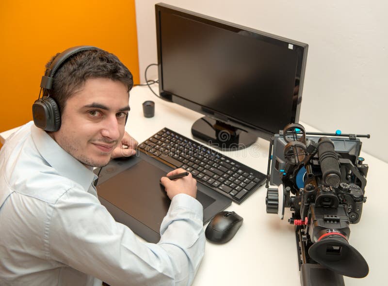 Young Man Designer Using Graphics Tablet for Video Editing Stock Image ...