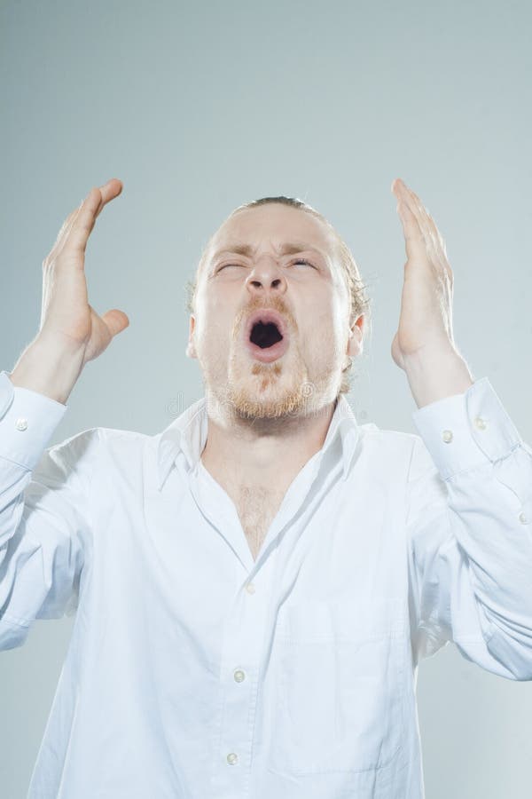 Young man is desperately stock photo. Image of phone - 39501060