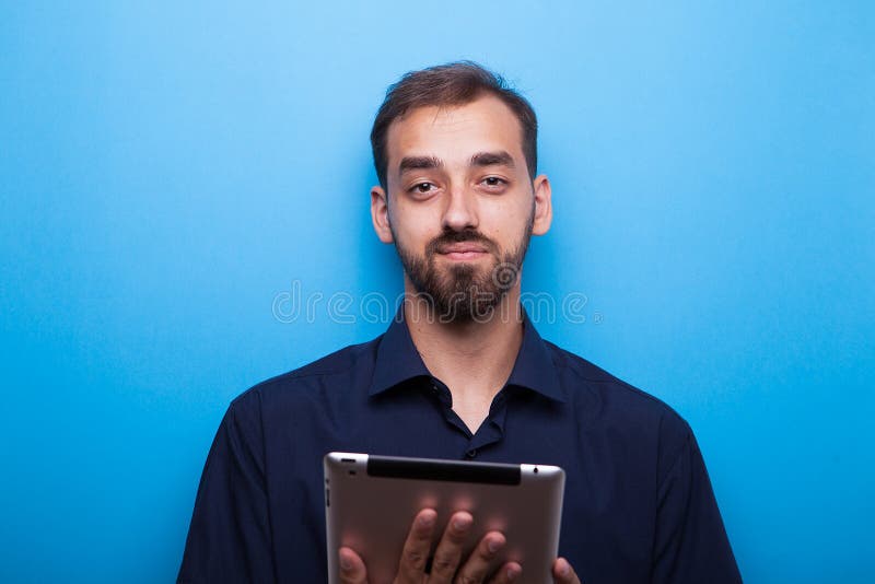 Young Man with a Digital PC in His Hands Stock Image - Image of adult ...