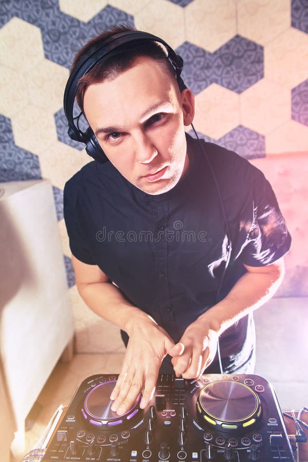 Young Man DJ with Mixer is Working Stock Photo - Image of electronics ...