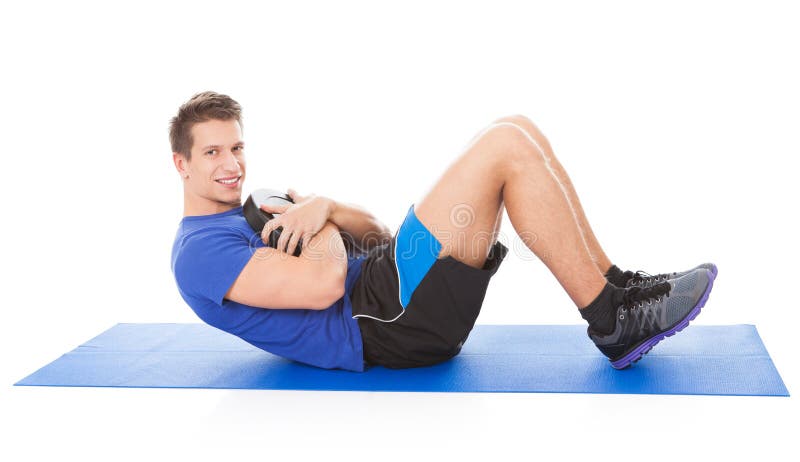 Young Man Doing Crunches stock image. Image of muscular - 57196881