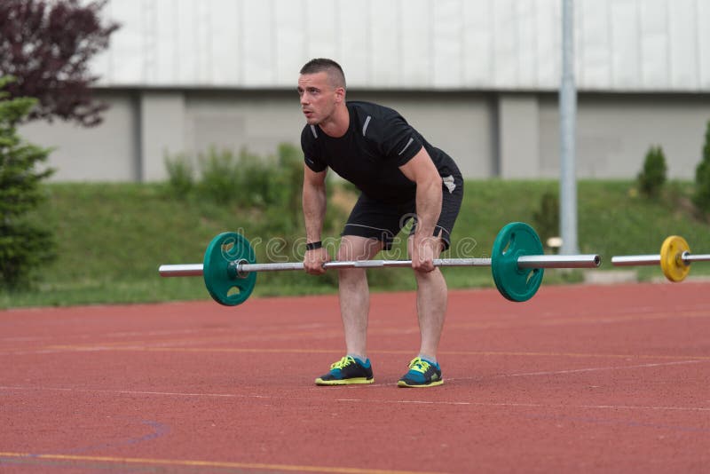 Young Man Doing a Deadlift Exercise Outdoor Stock Image - Image of ...