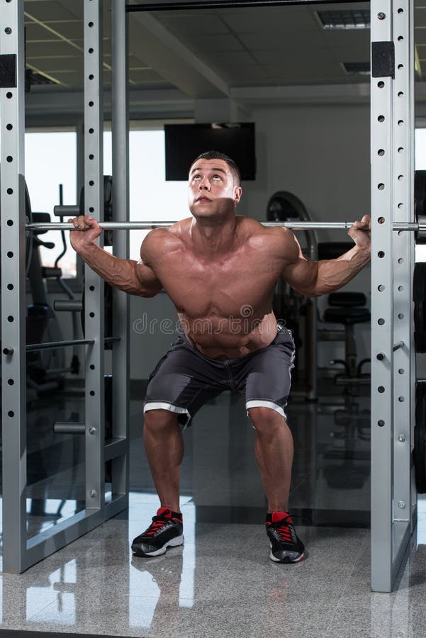 Young Man Doing Exercise Barbell Squat Stock Image - Image of barbell ...