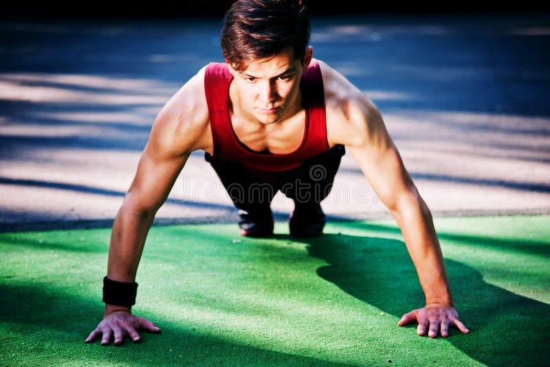 Young Man Doing Fitness Exercise Stock Image - Image of casual, healthy ...