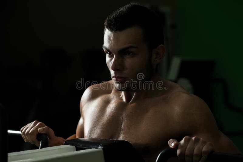 Young Man Doing Heavy Weight Exercise for Back Stock Image - Image of ...