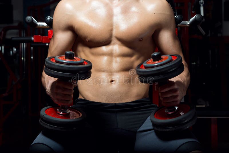 Young Man Doing Heavy Weight Exercise in Gym. Stock Photo - Image of ...