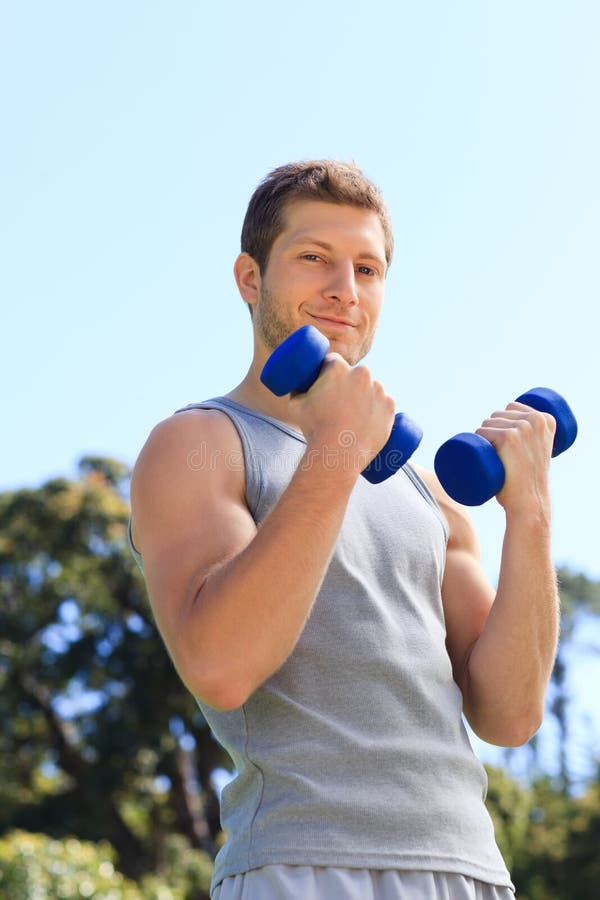Young Man Doing His Exercises Stock Image - Image of happy, sports ...