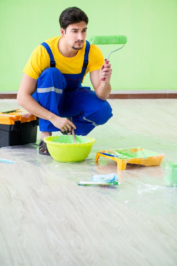 The Young Man Doing Home Renovation Stock Image - Image of painting ...
