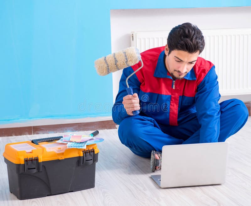 Young Man Doing Home Renovation Stock Image - Image of home, blue ...