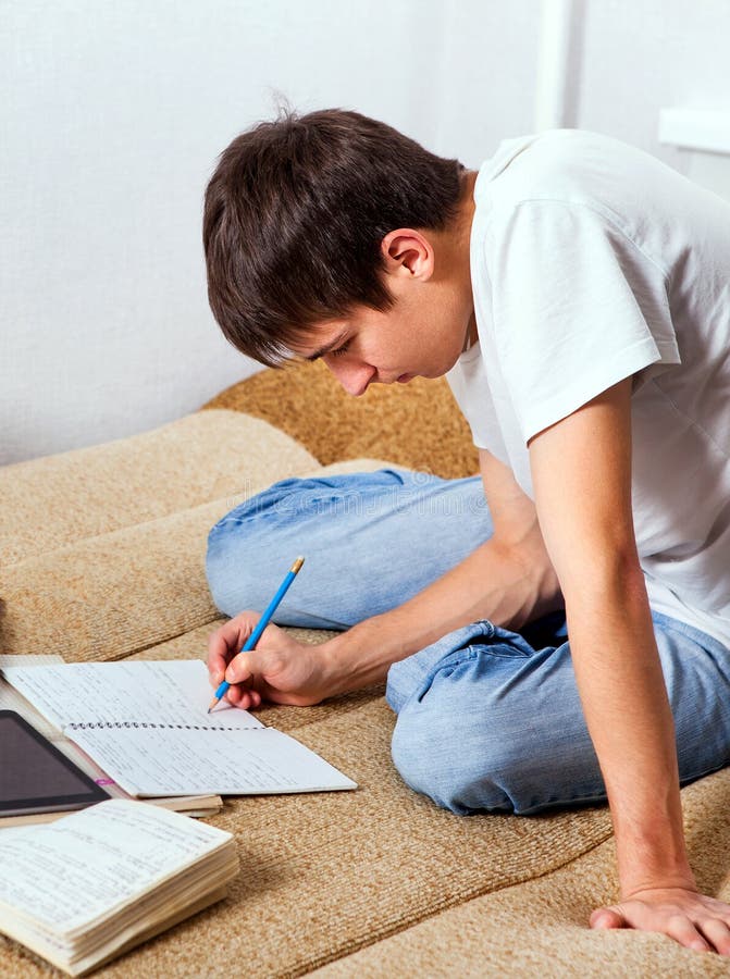 Student doing Homework stock image. Image of head, learn - 132561343