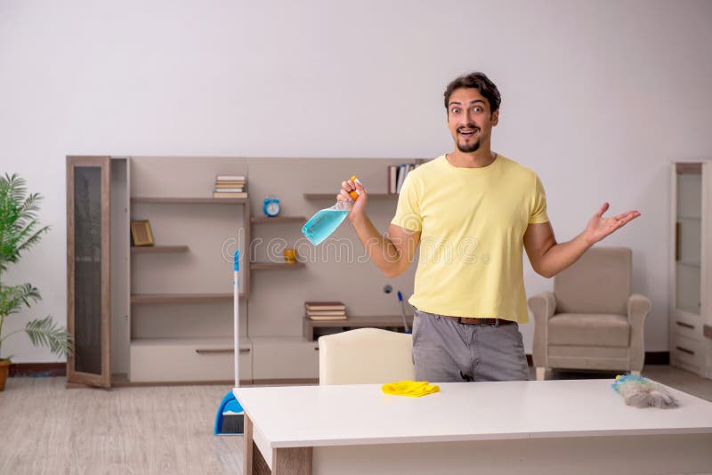 503 Man Dusting Desk Stock Photos - Free & Royalty-Free Stock Photos ...