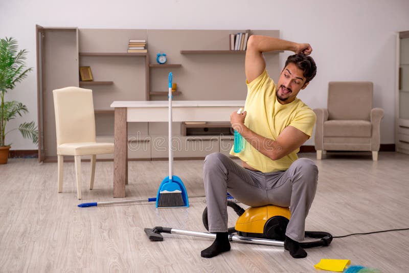 Young Man Doing Housework at Home Stock Photo - Image of clean, armpit ...
