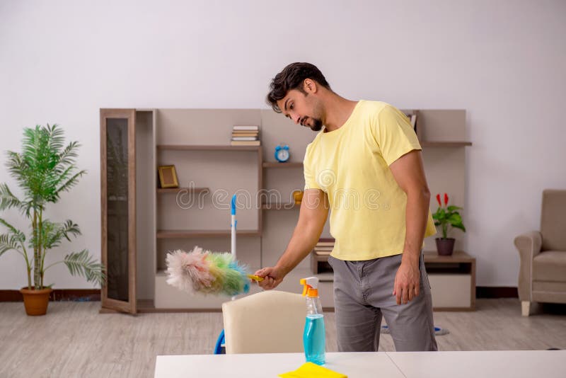 543 Man Dusting Desk Stock Photos - Free & Royalty-Free Stock Photos ...