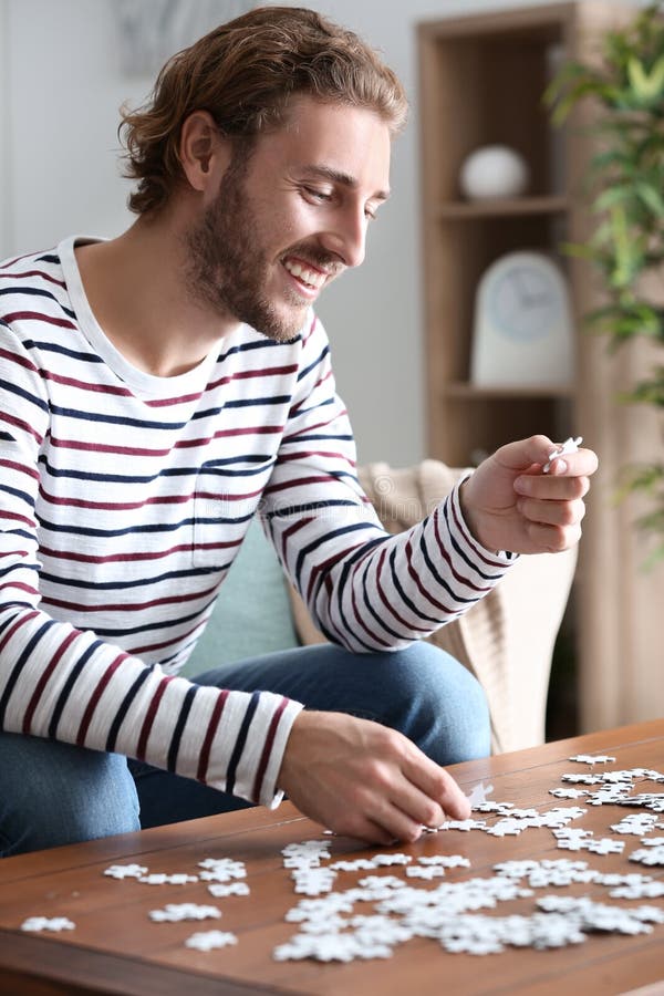 266 Man Doing Puzzle Stock Photos - Free & Royalty-Free Stock Photos ...